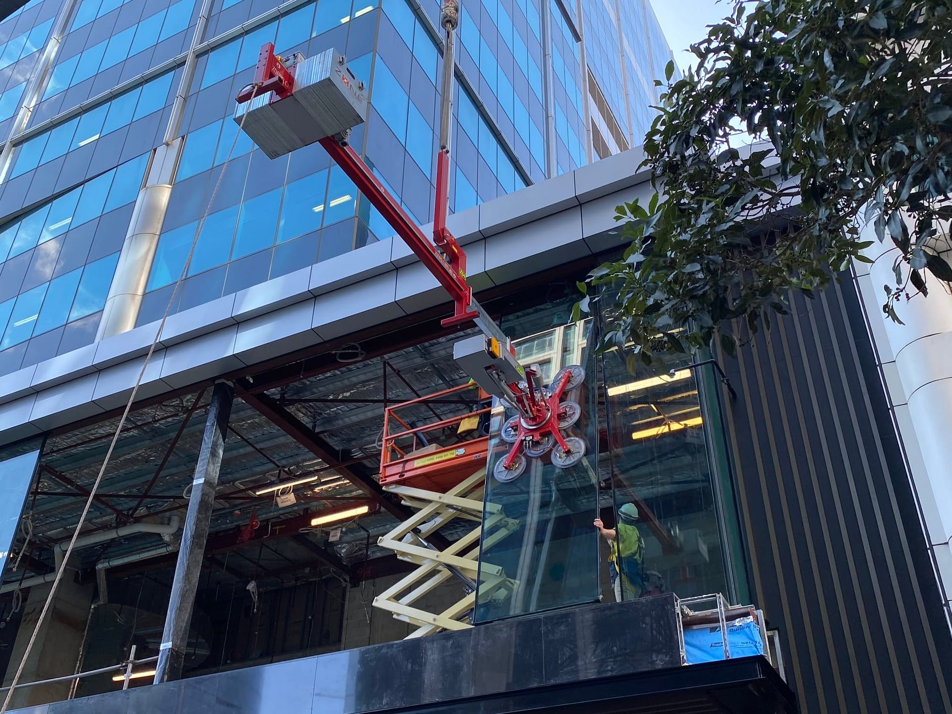 Crane With Offset Lifting Beam And Oktopus Glass Lifter Zone Group